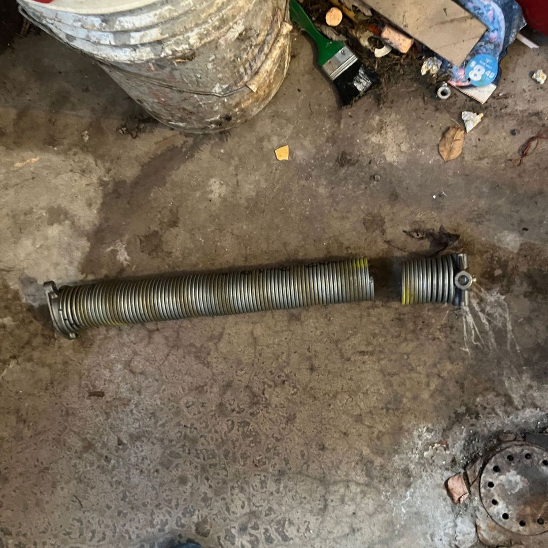 Broken Spring Repair Services | Elite Garage Door Masters